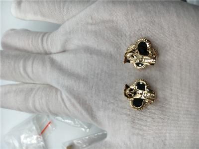 Cina Oro giallo d'annata degli orecchini 18k di Van Cleef Arpels Alhambra con i gioielli dell'indennità dell'onyx in vendita
