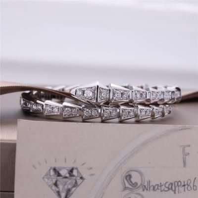 Cina Il braccialetto esile Serpenti della un-bobina romanzesca della vipera dell'Italia nell'insieme dell'oro bianco 18K con i diamanti pieni del pavé serpeggia il braccialetto in vendita
