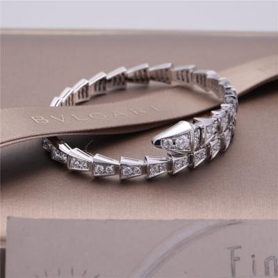 Cina Il braccialetto esile Serpenti della un-bobina romanzesca della vipera dell'Italia nell'insieme dell'oro bianco 18K con i diamanti pieni del pavé serpeggia il braccialetto in vendita