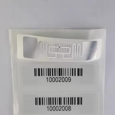 China Etiqueta de venta al por menor con código de barras imprimible Uhf RFID Etiqueta suave para el sistema de gestión de inventario EAS del supermercado en venta
