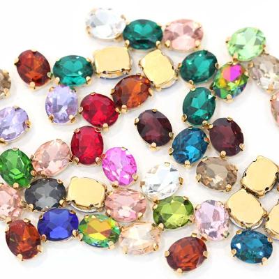 China Ellipse Oval Glass Gold Claw Base 4 Holes Sew on Rhinestones Earring Mask Hair Clasp Shoes Decoration Shiny Trimmings for sale