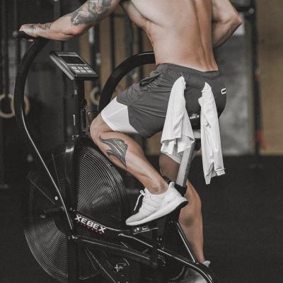 China Double-layer Sports Quick-drying Shorts Five-point Shorts European American Men's Summer New Fitness Training Running Men Woven for sale