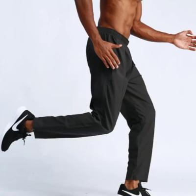 China Autumn And Winter New Sport Fitness Loose Leggings Basketball Running Men's Casual Pants jogger track pant for sale