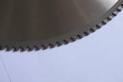 Close-up of saw blade teeth