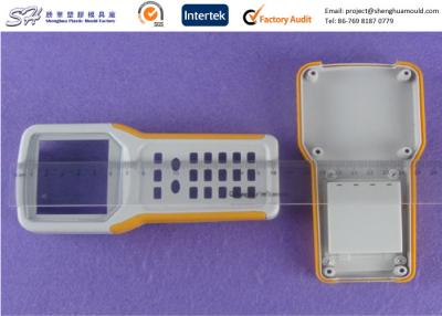 中国 電子工学の オーバーモールド の射出成形のための携帯用手持ち型のプラスチック エンクロージャ 販売のため