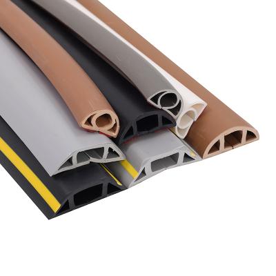China The Ground Is Thickened with Anti-collision PVC Wire Raceway Grey Yellow Black Trapezoidal Cable Trough for sale