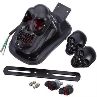 China Motorcycle Parts Black Skull Brake Tail Light with Turn Signal 1 Pair Turn Light for sale