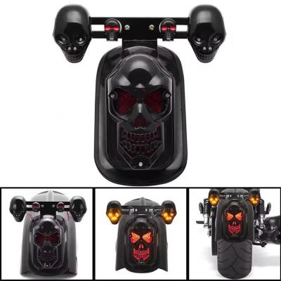 China Motorcycle Parts Black Skull Brake Tail Light with Turn Signal 1 Pair Turn Light for sale