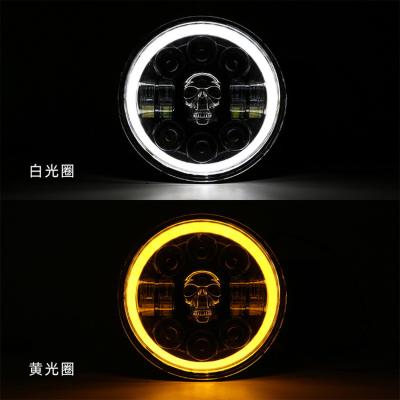 China Motocicletas modificadas 6,3 polegadas LED redondo faróis com design de crânio personalizado à venda