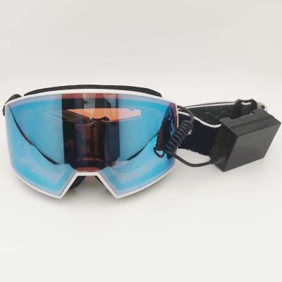 Cina Imita lenti REVO riscaldate elettricamente Motoslitte Occhiali da sci in neve con batteria personalizzata in vendita