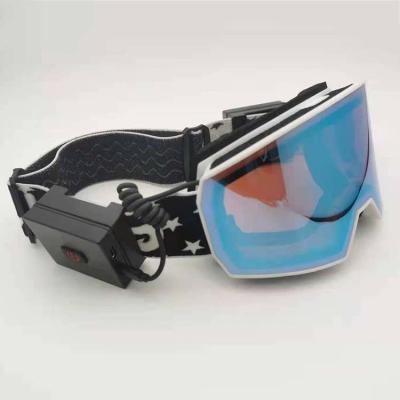 Cina Imita lenti REVO riscaldate elettricamente Motoslitte Occhiali da sci in neve con batteria personalizzata in vendita