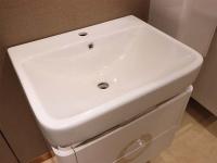 China Custom PVC Bathroom Cabinet with Ceramic Basin 60cm Circular Mirror Wall Hanging Vanity for sale