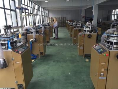 中国 黄色いジャッカルドキャップ生産 オペク 完全自動アラームを持つムスリムキャップ編み機 販売のため