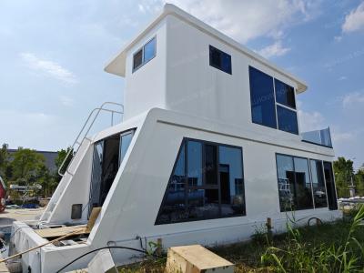 China Twee verdiepingen 4,0 meter breed Aluminium Boat House 11,5 meter lang Luxe drijvende huisboot Te koop