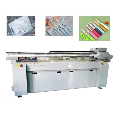 China Advanced UV Flatbed Printer with 7.5CPI Printing Speed for Multi-Colour Printing and 10cm Medium Height for sale