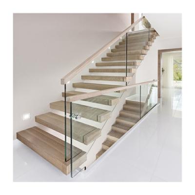 Cina Hard wood floating stairs price customized wood tread single stringer floating staircase in vendita