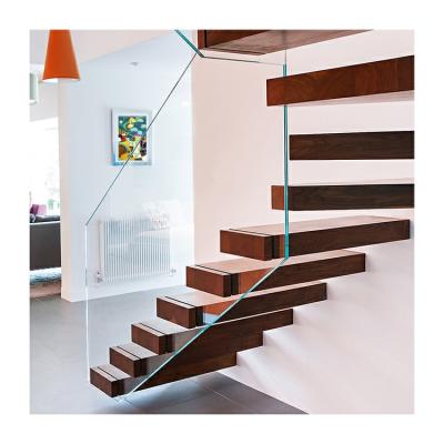 Cina Floating timber staircase design teak wooden treads stair floating staircase construction in vendita