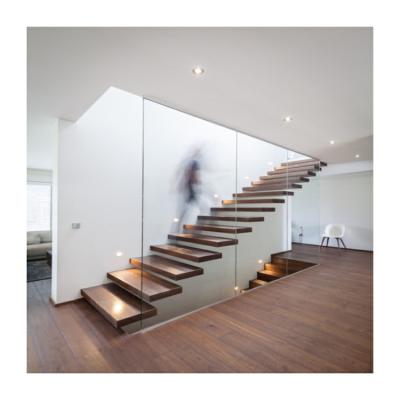 China Solid wooden floating staircase oak wood staircase floating stairs with railing à venda