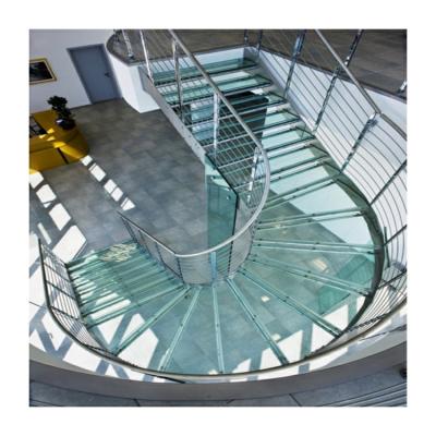 Cina Professional led glass concrete round staircase design open curved stairway in vendita