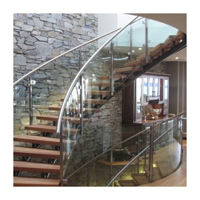 Cina Timber tread iron round staircase design South Sudan curved modern stairway in vendita