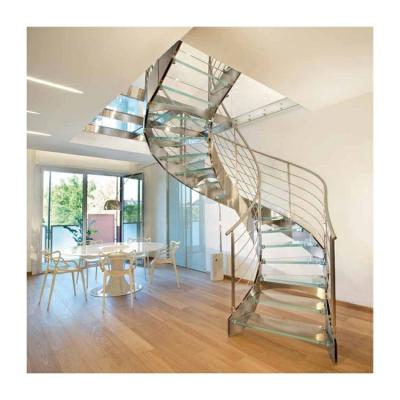 Cina Customized design tmepered glass modern curved staircase indoor stairway in vendita