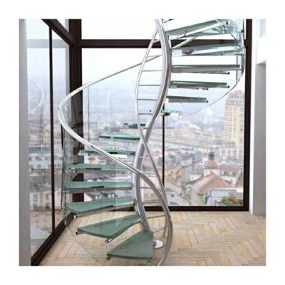 Cina Industrial Multilayer glass curved round spiral steel staircase how to draw curved stairway in vendita