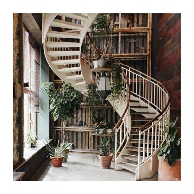 China Solid timber steps curved metal staircase United Arab Emirates reconditioned curved stairlifts for sale