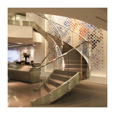 Cina Solid wood tread curved iron staircase Malawi curved stairway construction in vendita