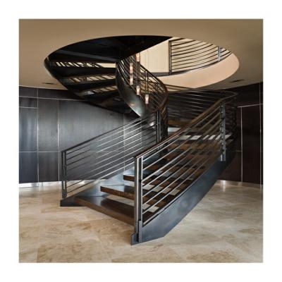 Cina Solid wooden tread circular staircase design Netherlands custom curved stairway in vendita