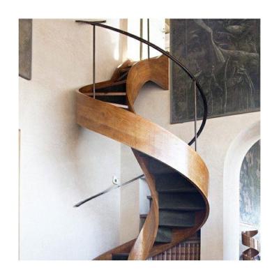 China Solid wooden tread framing curved stairs on site Peru half round stairway for sale