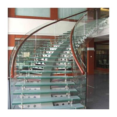 Cina Indoor decoration pvb laminated glass curved concrete stairs contemporary curved stairway in vendita