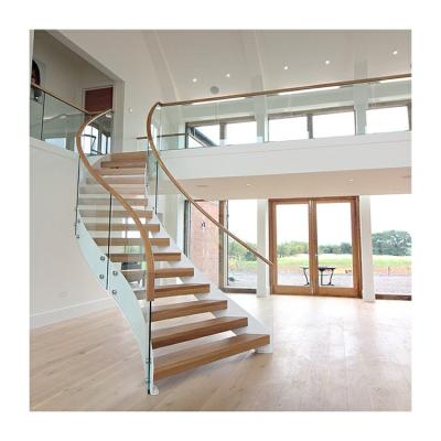 Cina Arch Curved Wooden Staircase With Qatar Stairway Gate Solid Steps in vendita