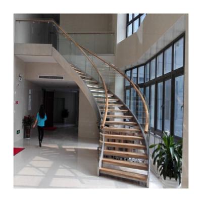 Cina Timber treads curved staircase decor French Guiana steel round stairway design in vendita