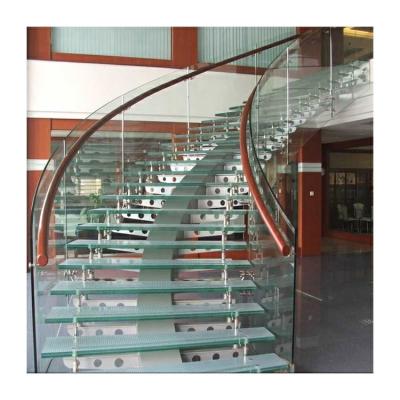 Cina Competitive price double layer glass curved mono stringer staircase how to make curved stairway in vendita