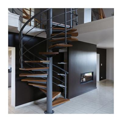 Cina Townhouse duplex house spiral stairs wooden steps and metal spiral staircase in vendita