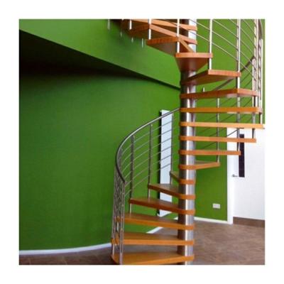 Cina Villa small steel wood stair design customized glass spiral staircase in vendita