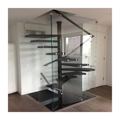 Cina Modern building wooden stairs treads log spiral staircase in vendita