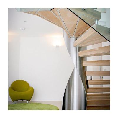 Cina Customized elegant wood stairs modern residential spiral staircase in vendita