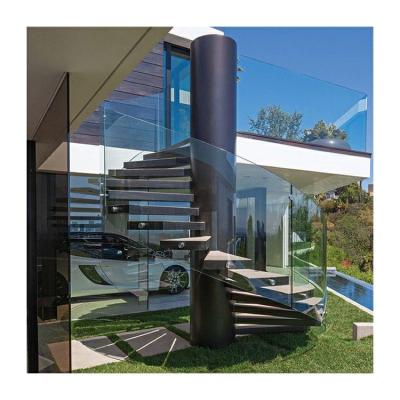 Cina Modern building glass wooden curved stairs prefabricated spiral staircase in vendita