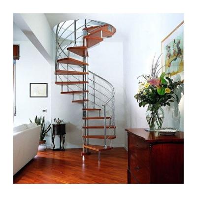 Cina Household individual white wood tread stairs rod baluster spiral staircase in vendita