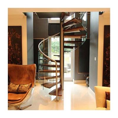 Cina Foshan factory thick solid wooden tread stair indoor spiral staircase in vendita