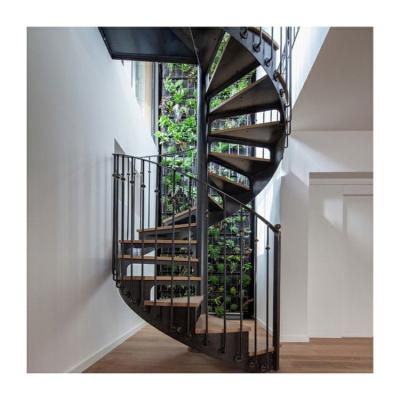 Cina Foshan factory unique style spiral stairs carbon steel wood spiral staircase in vendita