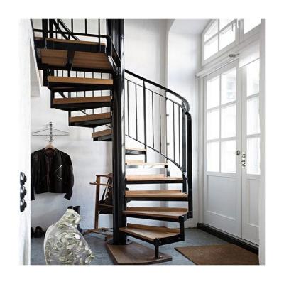 Cina Foshan factory wooden step spiral staircase steel plate spiral stairs in vendita