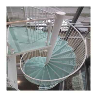 Cina China manufacturer residential steel stairs tempered glass spiral stair in vendita
