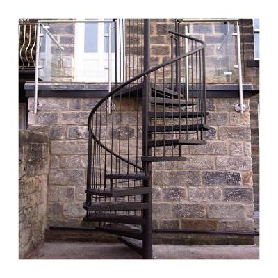 Cina Prefab metal stair railing steel structure indoor stairs iron work spiral staircase in vendita