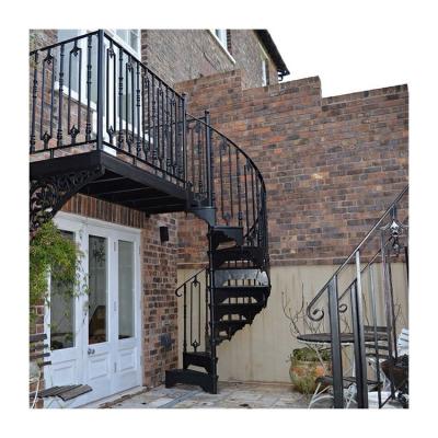 Cina Used metal outdoor stairs steel pipe stair handrail interior wrought iron spiral staircase in vendita