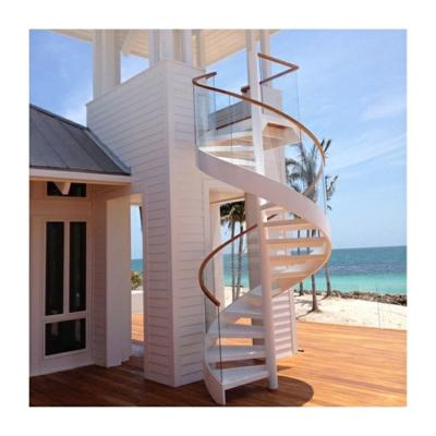 中国 Modern wrought iron handrails round metal staircase steel glass spiral stair 販売のため