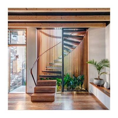 Cina Handrial bracket carbon steel spiral stair cheap steel wood spiral staircase in vendita