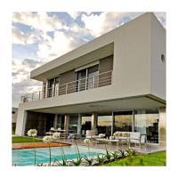 China Bermuda style galvanized rod fence ground level deck with railing for sale