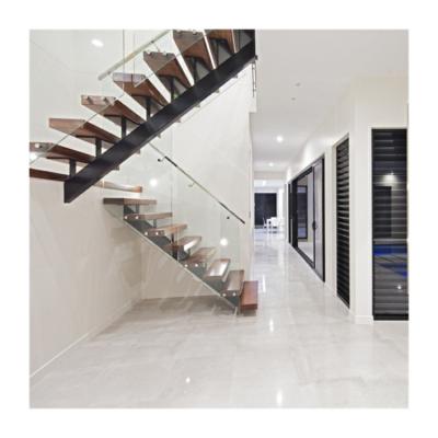 Cina Townhouse wood staircase with glass railing single stringer solid wood straight stair in vendita